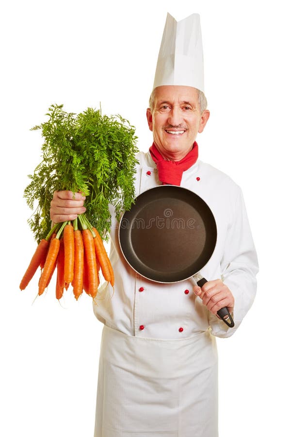 Cozinheiro Do Cozinheiro Chefe Com Bandeja E Grupo Das Cenouras Foto de ...
