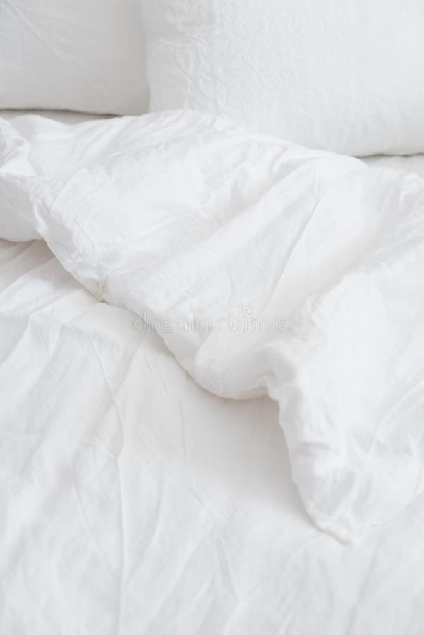Cozy Bed with Crumpled White Linen Stock Image - Image of textile ...