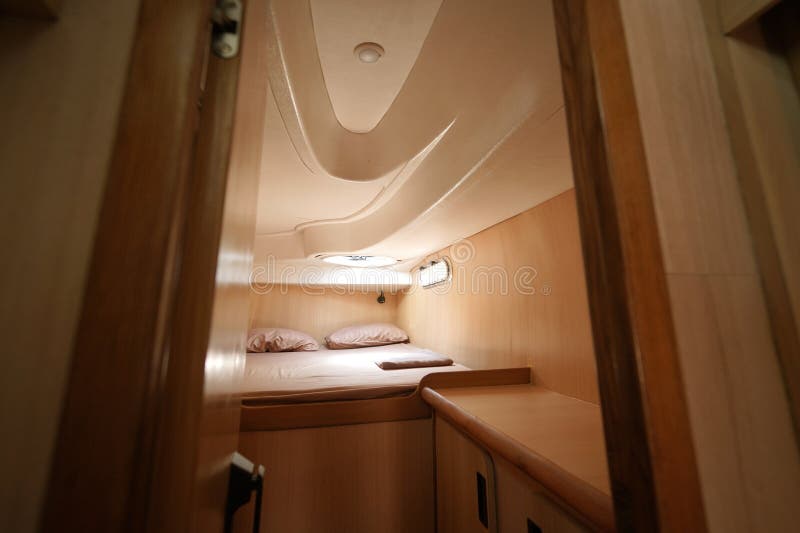 Cozy Bed on a Voyage Boat with a Window Overhead with Natural Light ...