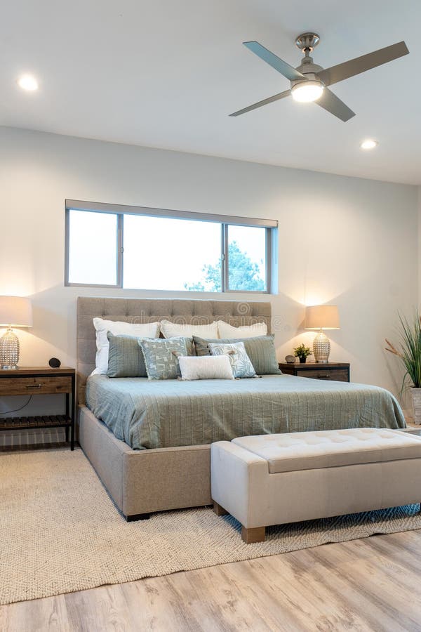 Cozy Bedroom Featuring Large Bed Accompanied Ceiling Fan Stock Photos ...