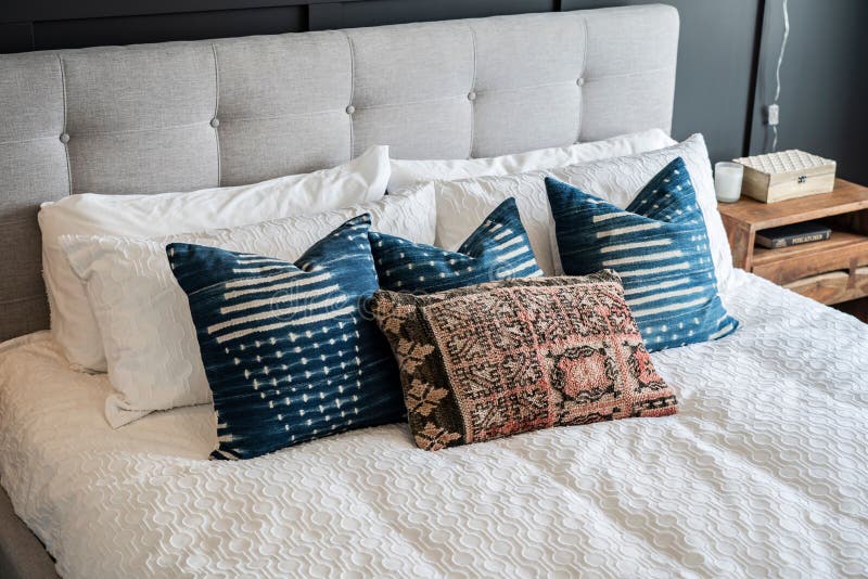 Cozy Bedroom with Fluffy Pillows on the Bed Stock Photo - Image of ... Cozy Bedroom with Fluffy Pillows on the Bed Stock Photo - Image of ...