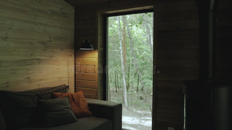 A Cozy Cabin Interior Featuring Inviting Views of the Surrounding ...