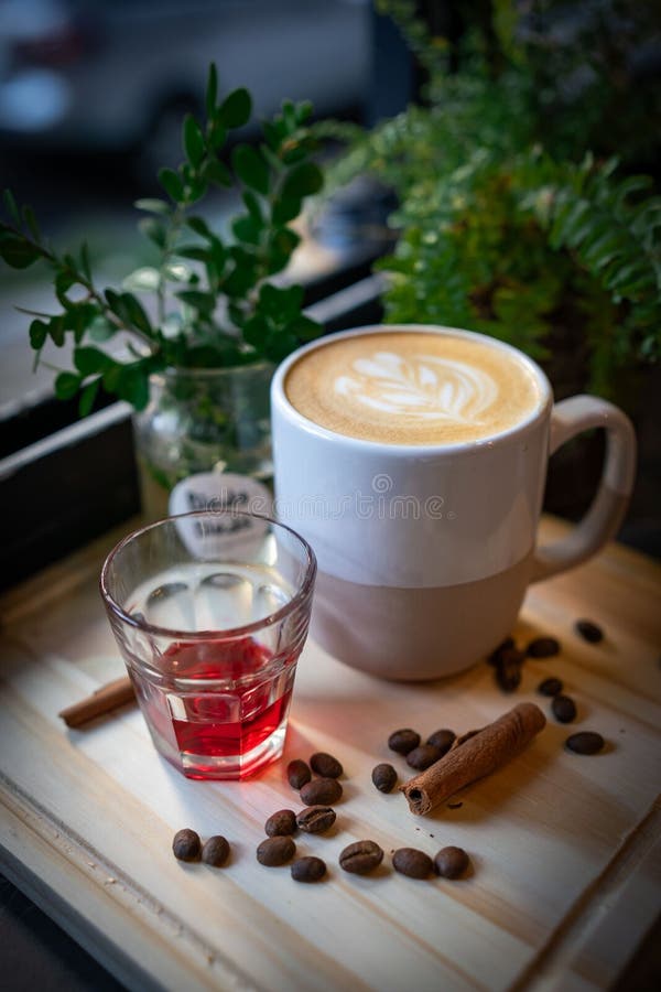Cozy Coffee Setup with Latte and Red Drink Editorial Photography ...