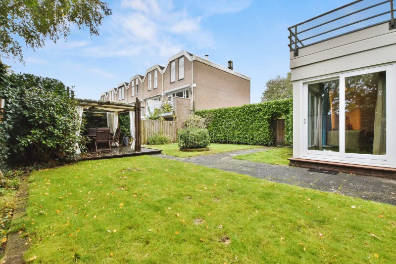 Cozy Courtyard Balcony with Fresh Lawn Stock Image - Image of lawn ...