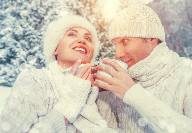 Cozy Dressed Couple in Love Drink Hot of Tea in Winter Forest Stock ...