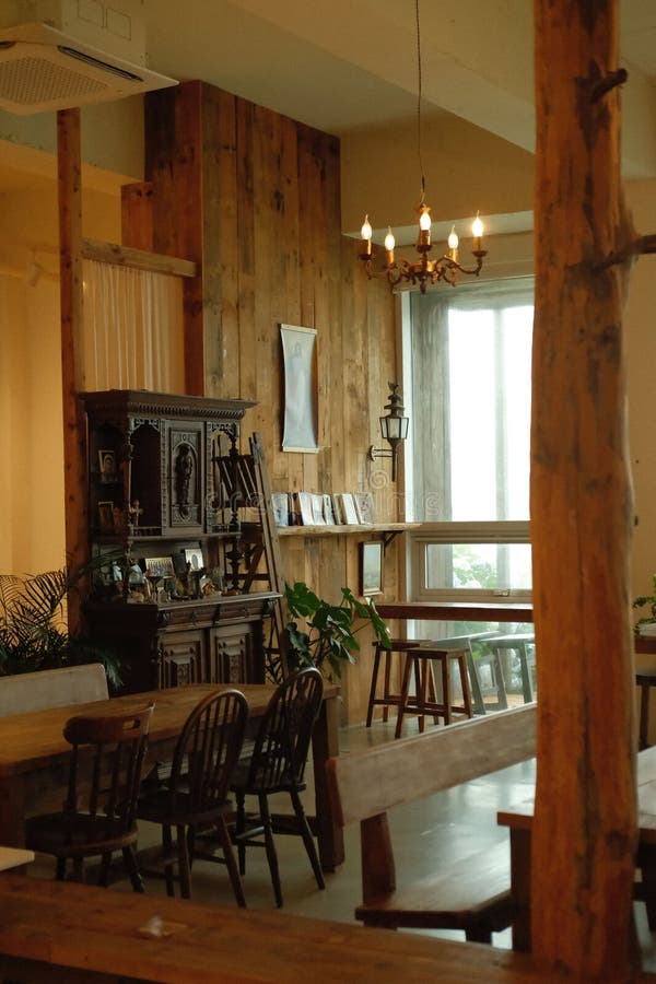 The Inside of a Rustic Home Office and Library Area with Desks Stock ...