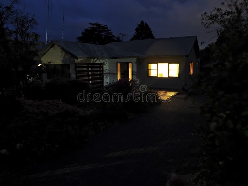 Cozy House with Warm Windows at Dusk Stock Photo - Image of cozy ...