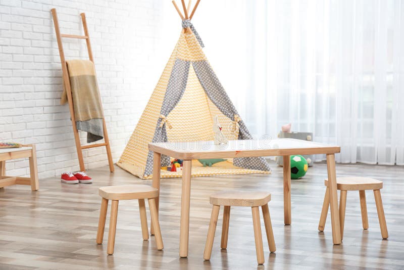 Cozy Kids Room Interior with Table, Stools Stock Photo - Image of ...