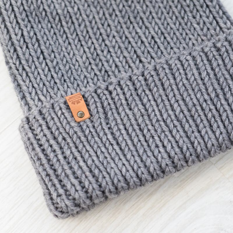 Cozy knitted grey hat stock image. Image of childhood - 163196467