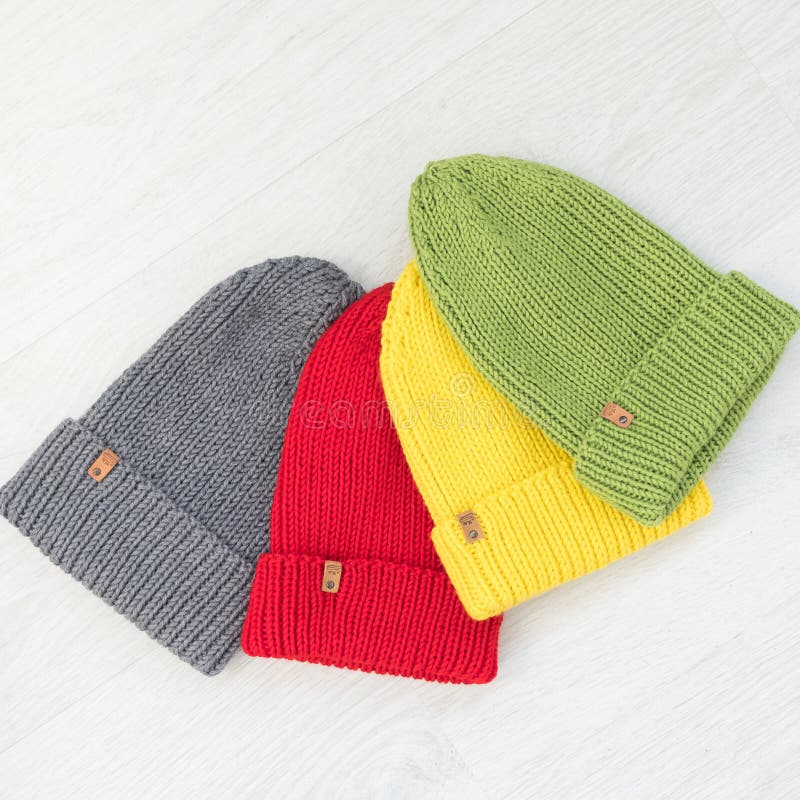Cozy knitted set of hats stock image. Image of small - 163196367