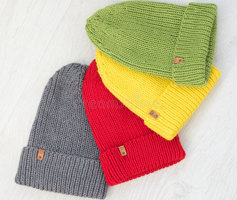 Cozy knitted set of hats stock photo. Image of brown - 163196390