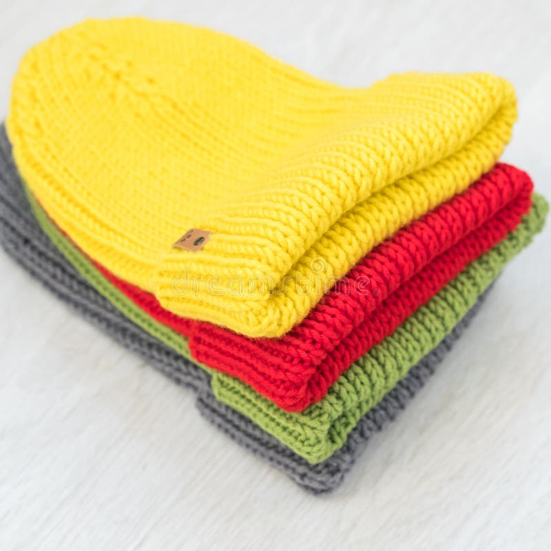 Cozy knitted set of hats stock photo. Image of brown - 163196626