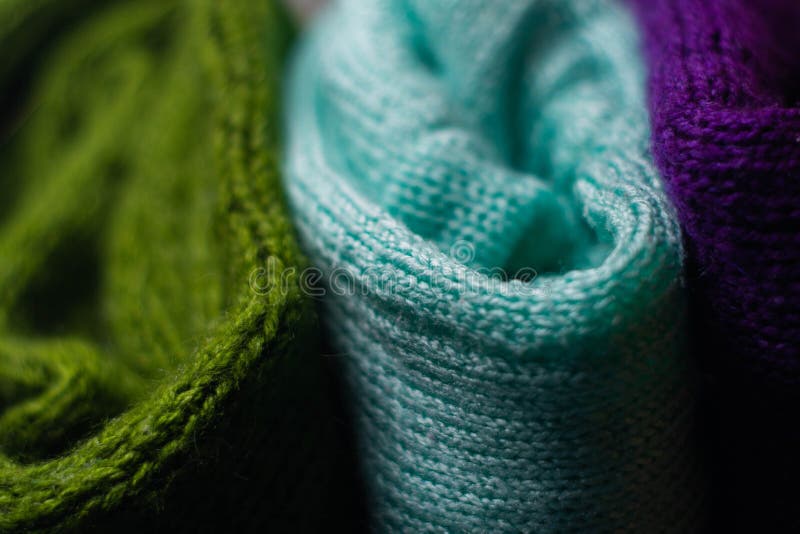 Cozy Knitted Sweaters of Different Colors are Stacked on Top of Each ...