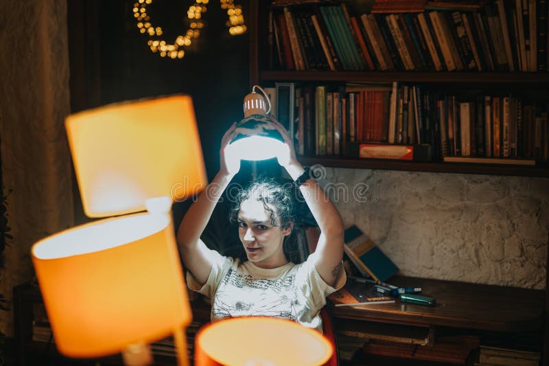 Cozy Library Scene with Person Showcasing Creativity Stock Photo ...