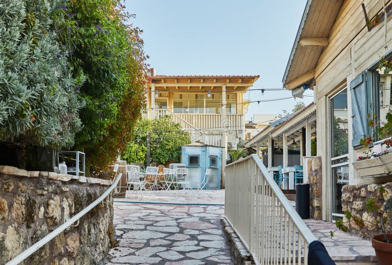 Cozy Mediterranean-style Cafe with Bridge and Railings in Israel Stock ...