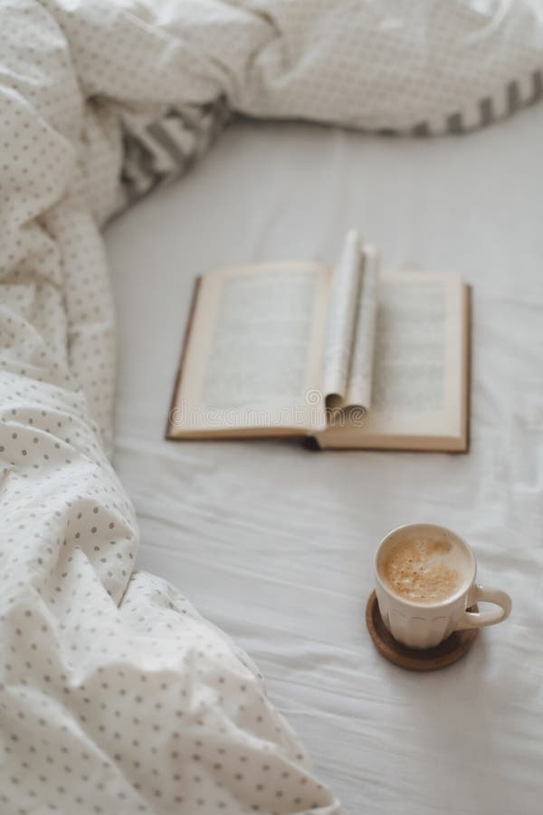 Cozy Morning Composition with a Coffee Cup and a Book with Pages Folded ...