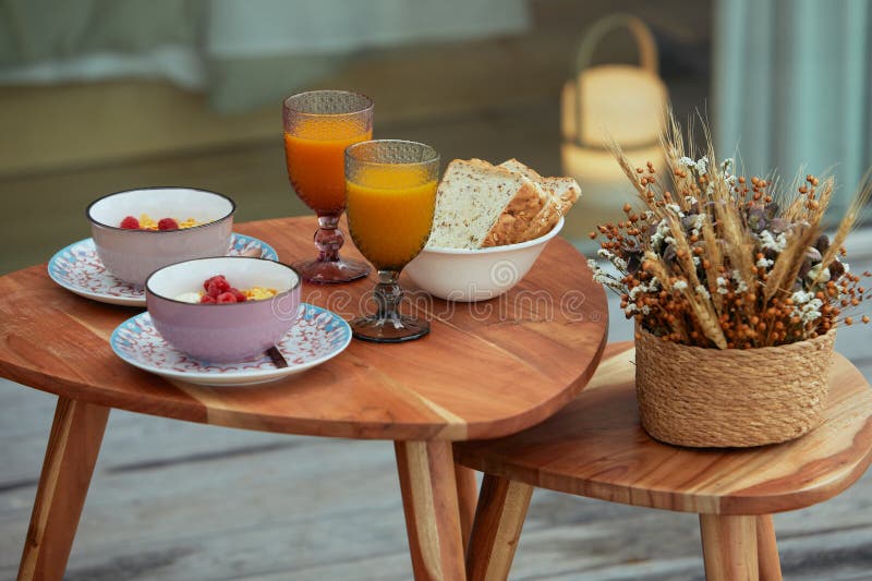 Outdoor Breakfast Setup with Fresh Juice and Cereal Stock Image - Image ...