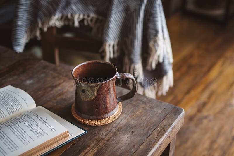 Cozy Reading Nook with Rustic Mug and Open Book Stock Illustration ...