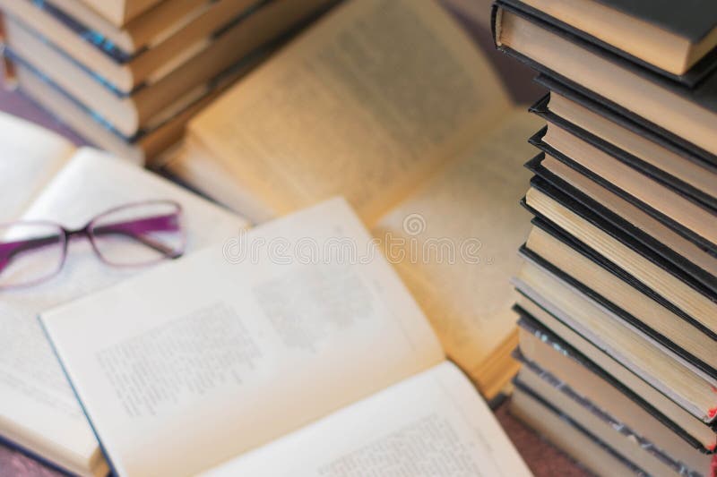 Cozy Reading Setup with Stack of Books and Glasses Stock Photo - Image ...