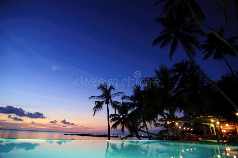 Tropical Beach Resort at Night. Stock Photo - Image of outdoor, lounge ...