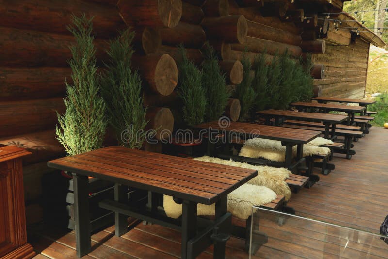 Cozy Restaurant with Outdoor Tables in Mountain Resort Stock Image ...