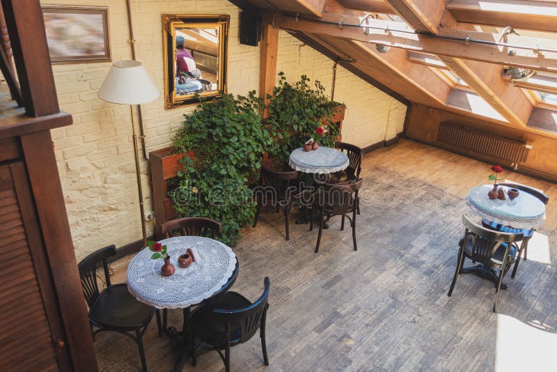 Cozy Retro Cafe Interior with Round Tables Stock Photo - Image of ...