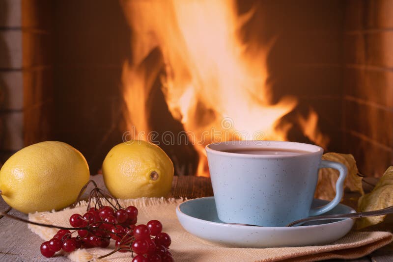 Cozy Scene before Fireplace Cup of Tea and Lemons Stock Photo - Image ...