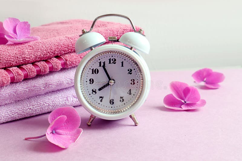 Cozy Spring Morning: White Alarm Clock with Pastel Hydrangea Flowers on ...