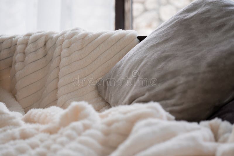 Cozy Textures and Warmth in a Soft Living Room Setting Stock Photo ...