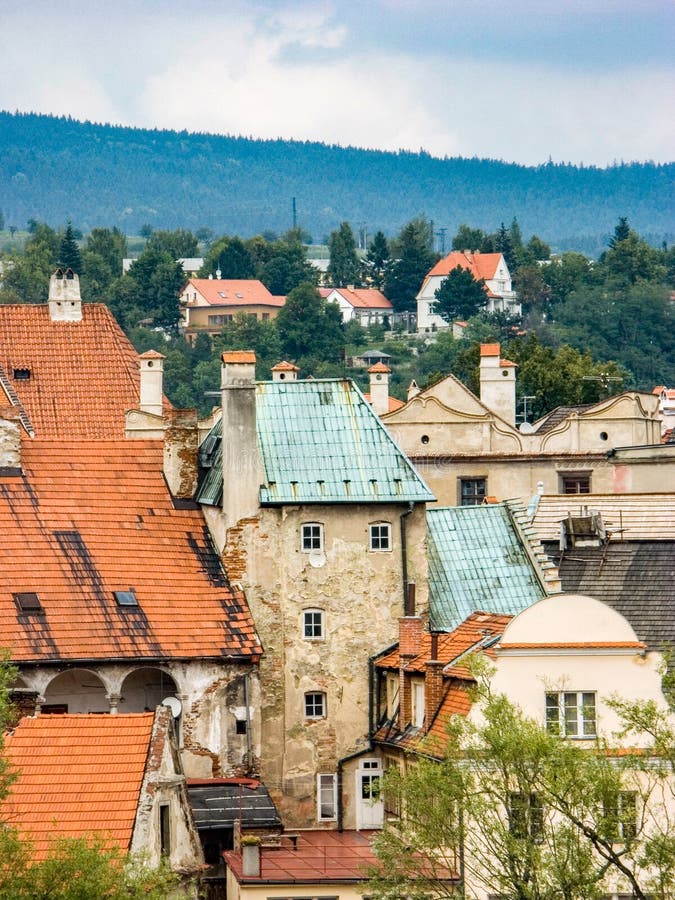 A Cozy Town Surrounded by Mountains on the Shore of a Small Mountain ...