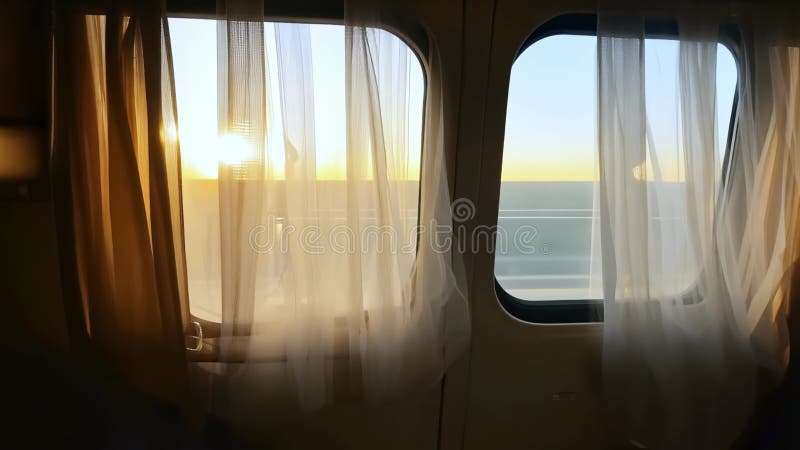 Cozy Train Cabin Interior with Soft Sunlight Streaming through Sheer ...