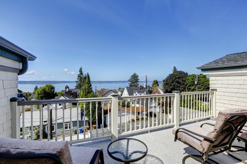 Cozy Walkout Deck Overlooking Scenic Bay View Stock Image - Image of ...