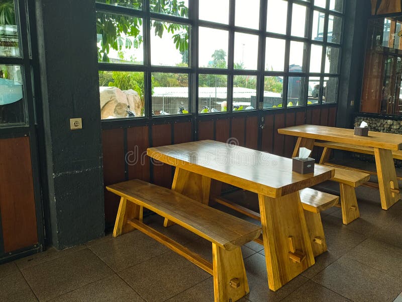 Cozy Wooden Benches in a Bright Indoor Cafe Setting Stock Photo - Image ...