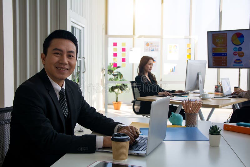 Cozy Work Environment. Successful Businessman Sitting at the Tab Stock ...