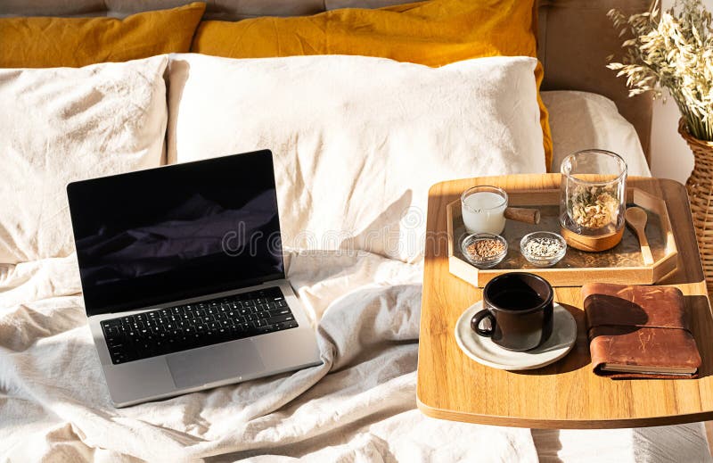 Cozy Work Morning in Bed with Laptop, Some Food and Coffee Cup Stock ...