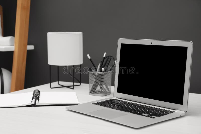 Cozy Workplace with Laptop and Stationery on Desk. Home Office Stock ...