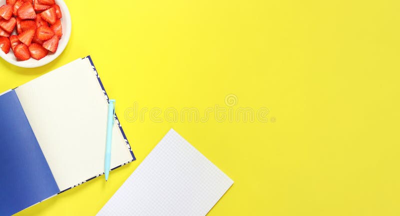Top View of a Work Desk, a Notebook for Notes, a Pen and a Plate with ...