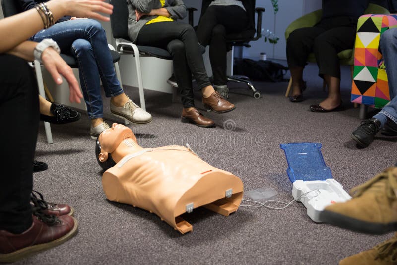 CPR Course Using Automated External Defibrillator Device, AED. Stock ...
