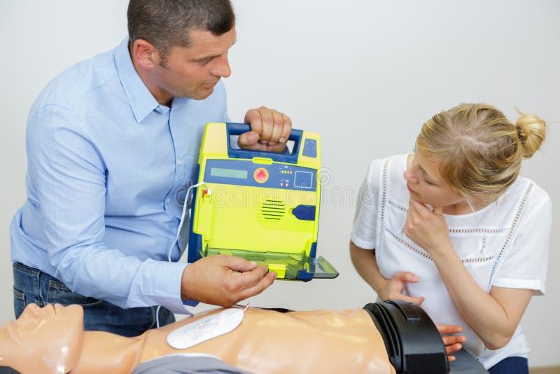 First Aid Instructor Showing Resuscitation Technique Stock Photo ...