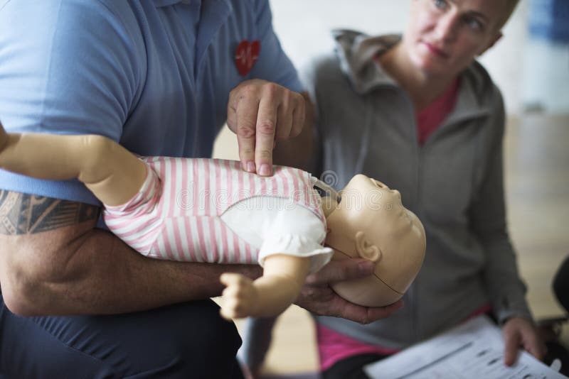Infant CPR Two Finger Cvompression Stock Image - Image of doll ...
