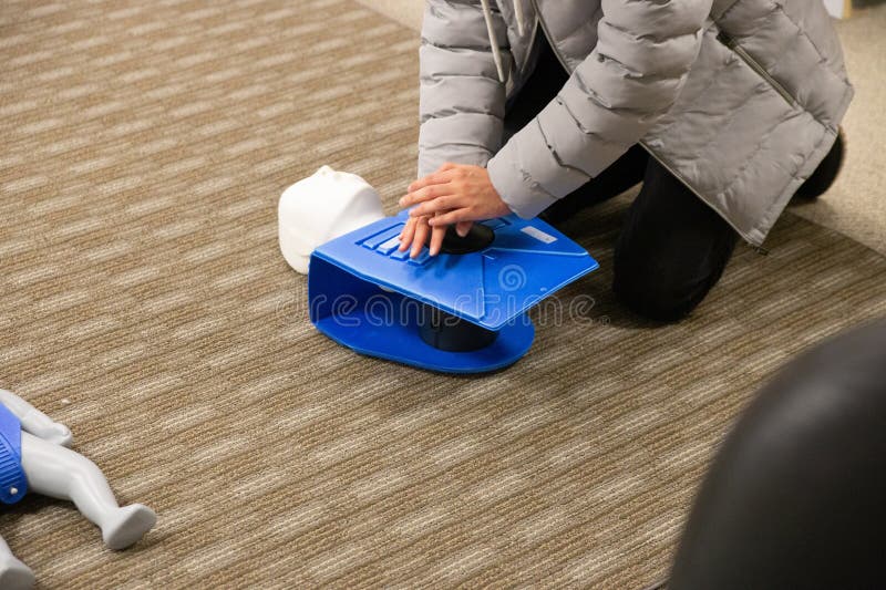CPR Training Class by Security Guard in Office Stock Photo - Image of ...