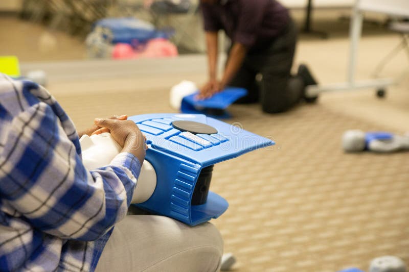 CPR Training Class by Security Guard in Office Stock Image - Image of ...