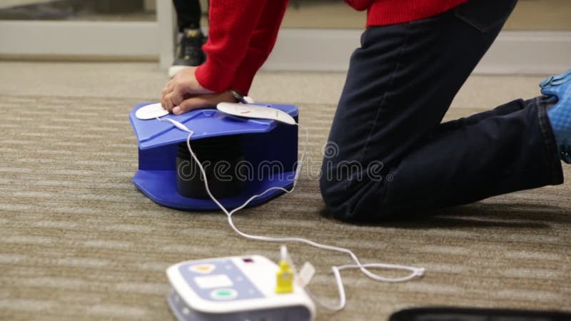 CPR Training Class by Security Guard in Office Stock Footage - Video of ...