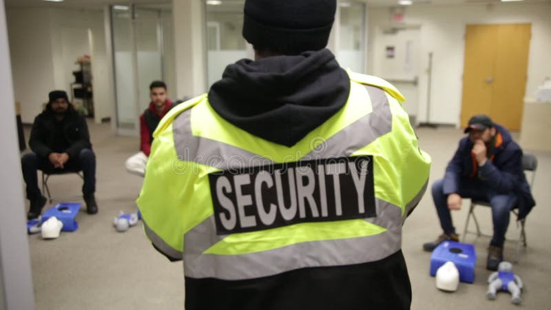 CPR Training Class by Security Guard in Office Stock Footage - Video of ...