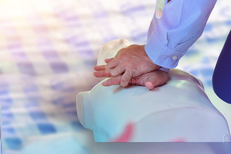 CPR Training Medical Procedure- Demonstrating Chest Compression Stock ...