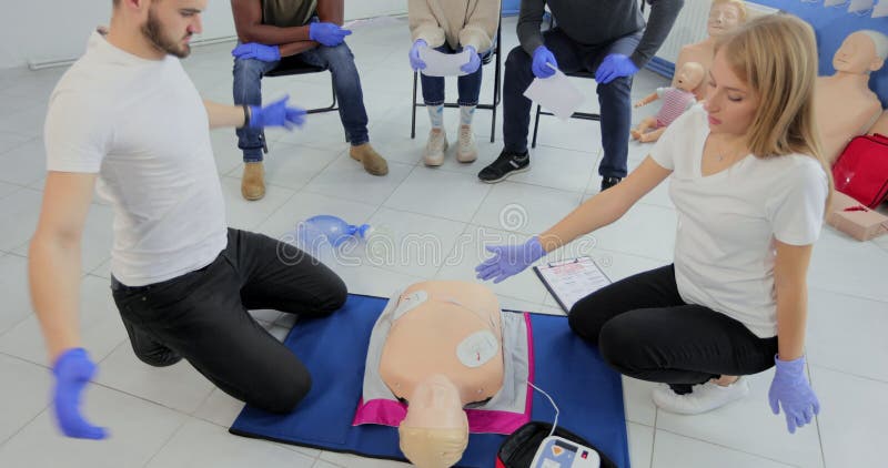 CPR Training Medical Procedure Workshop. Demonstrating Chest ...