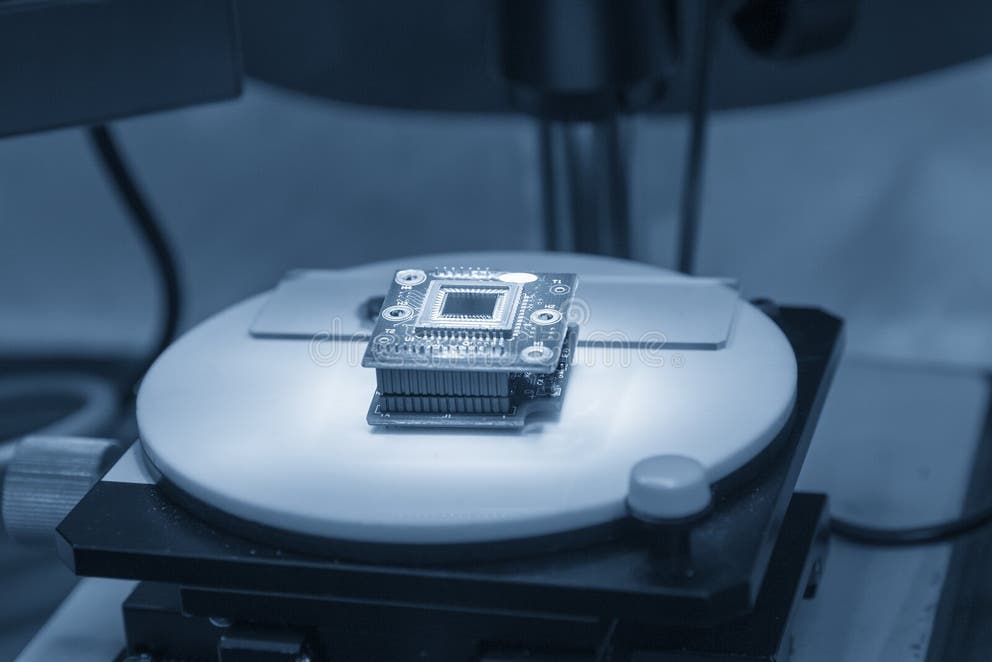 The CPU chip on microscope stock image. Image of integrated - 94750671