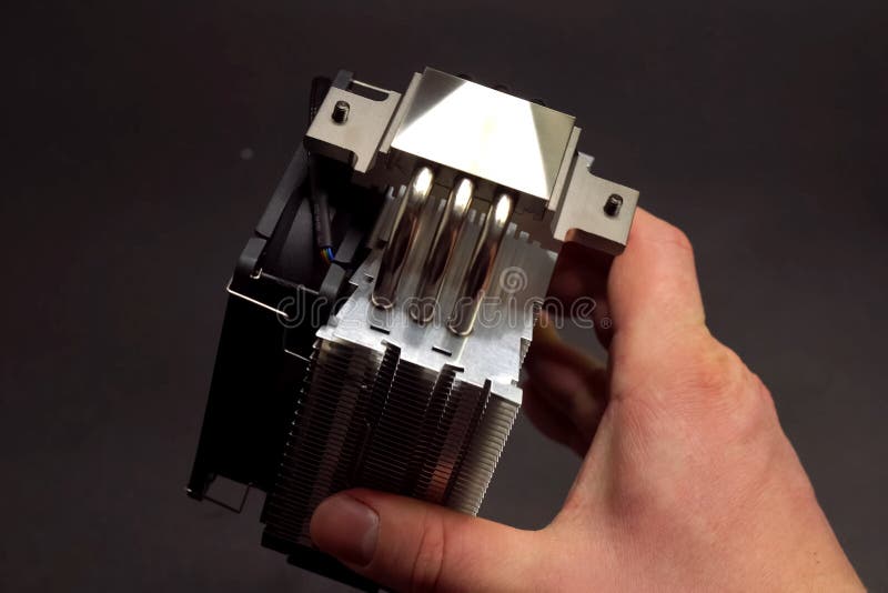 CPU Cooling System. Cooler with a Radiator in the Hands of Man Stock ...