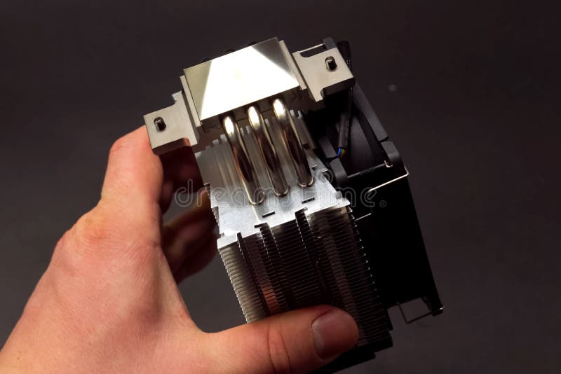 CPU Cooling System. Cooler with a Radiator in the Hands of Man Stock ...