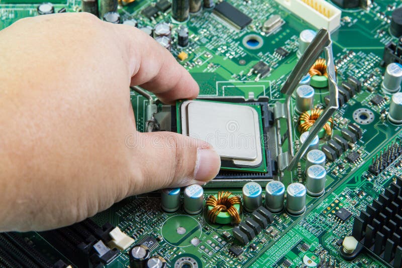 CPU in Hand before Installation into the Motherboard Stock Photo ...